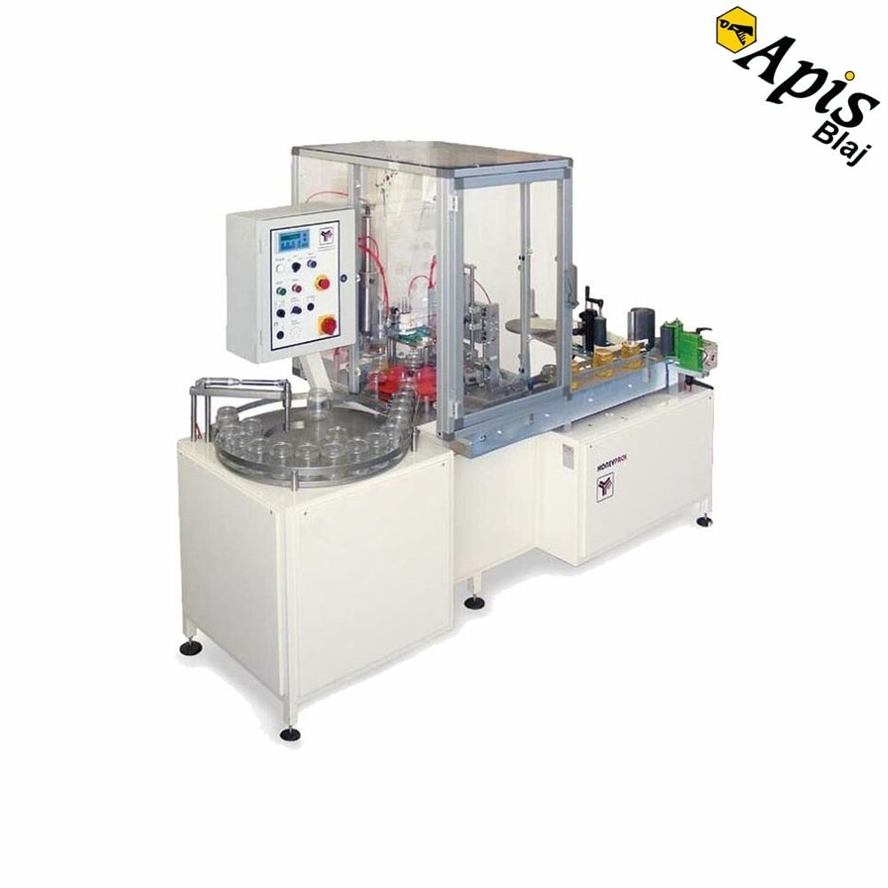 Masina de ambalat mierea la borcan, capsat si etichetat - Apis-Blaj.ro
